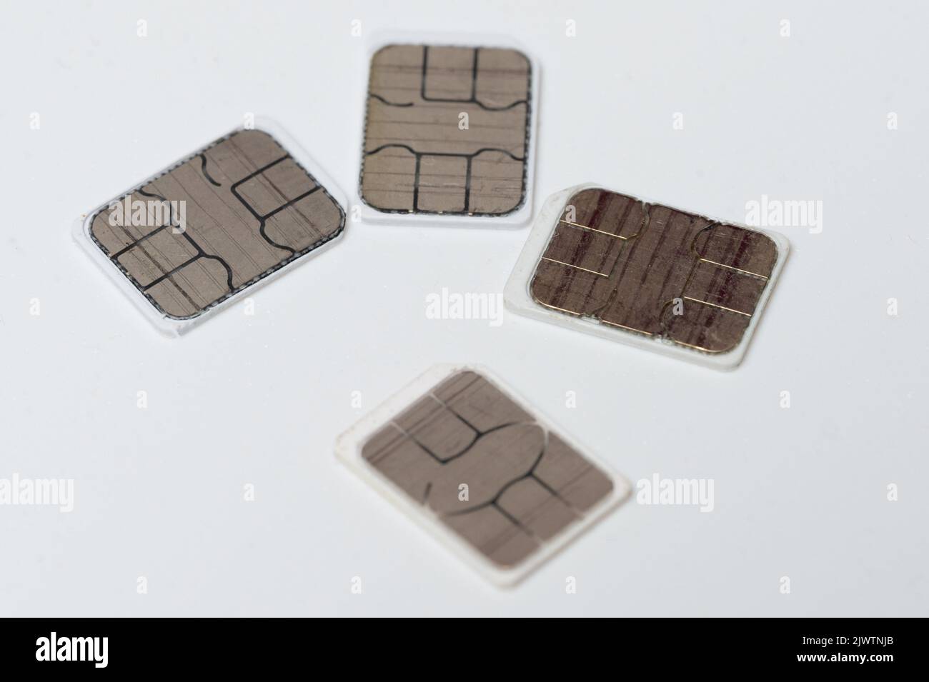 Mobile microchip simcards close up view isolated on studio background ...