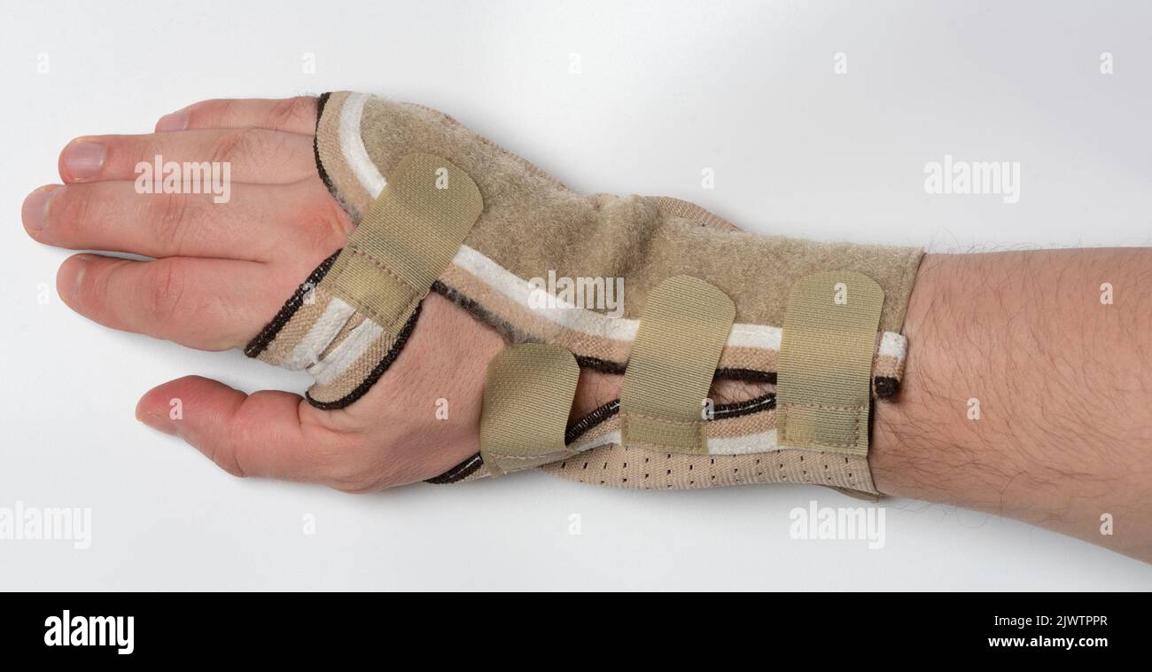 Wrist cloth medical support on hand isolated on studio background Stock ...