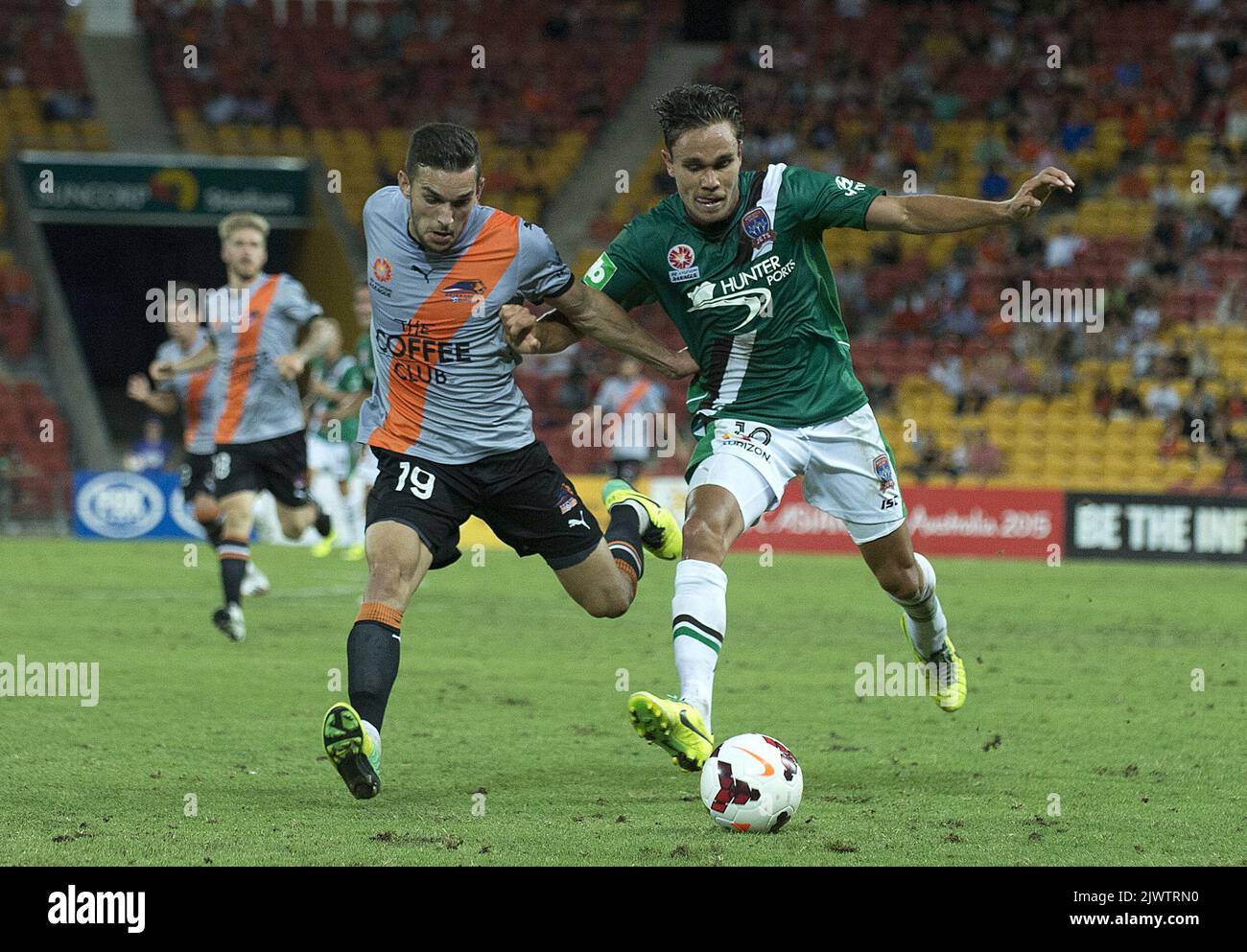 Brisbane's Jack Hingert (left) competes with Newcastles James Brown ...