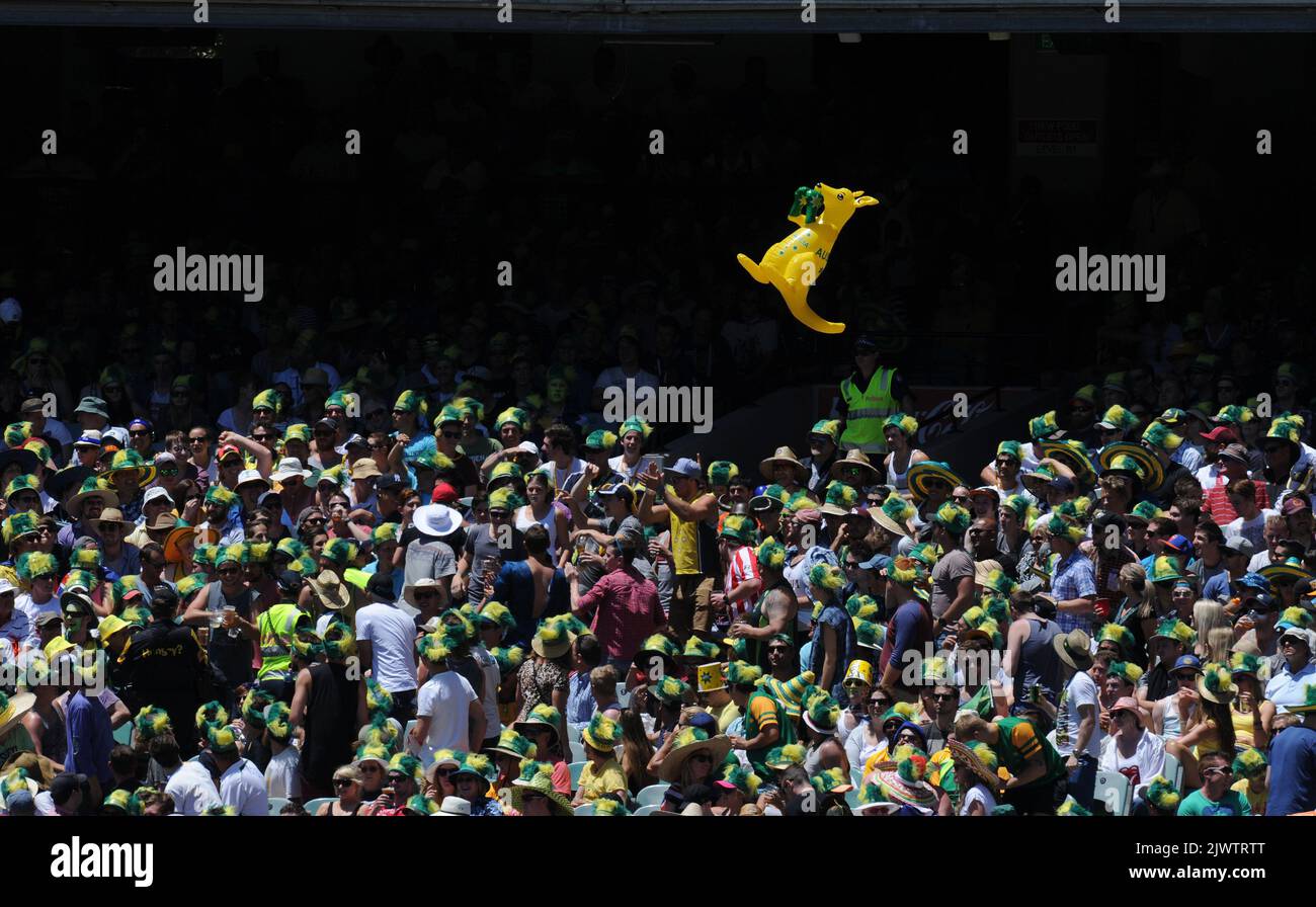 A inflatable yellow wallaby is passed above the crowd.NO ARCHIVING ...