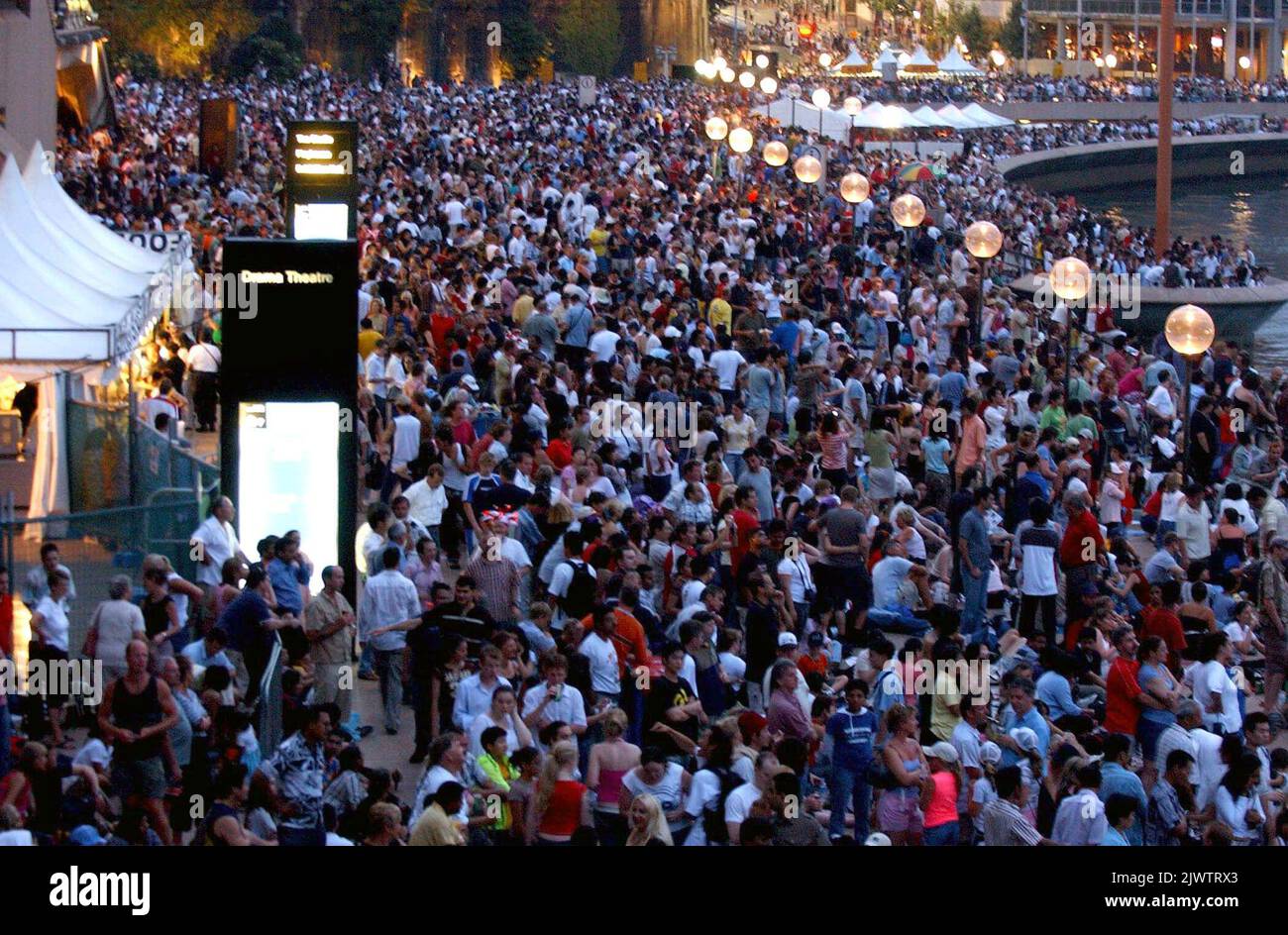 Sydney, December 31, 2003. Crowds pack into the Sydney Opera House ...