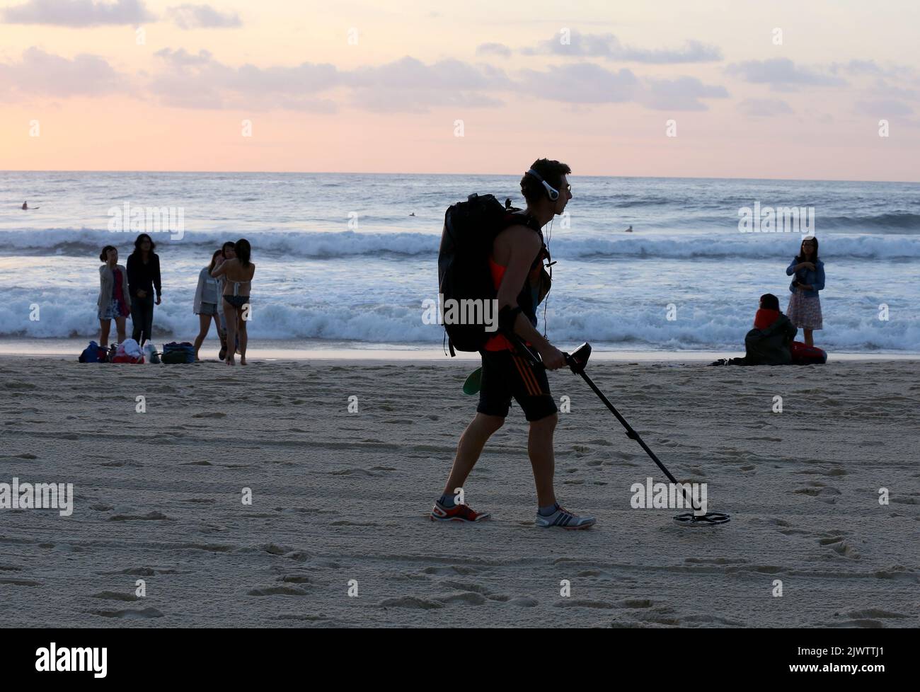New Year's Eve revellers on Bondi Beach at sunrise in Sydney, Wednesday ...