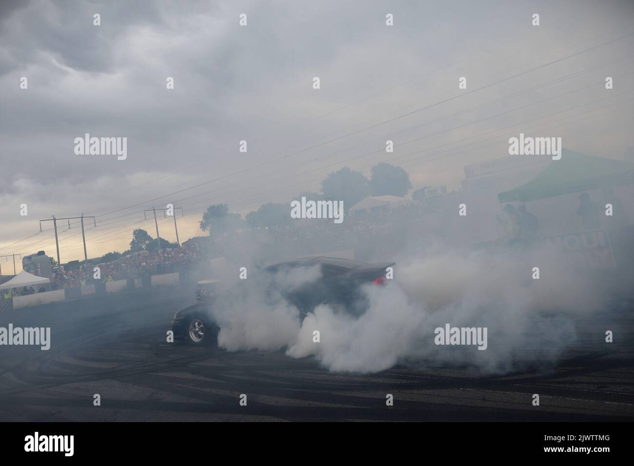 A car performs a burnout during the Summernats festival in Canberra ...