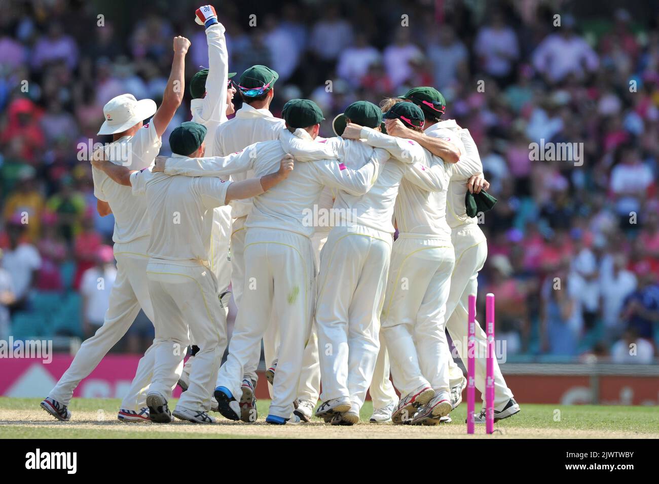 Australia players celebrate in a huddle after winning the ashes with a ...