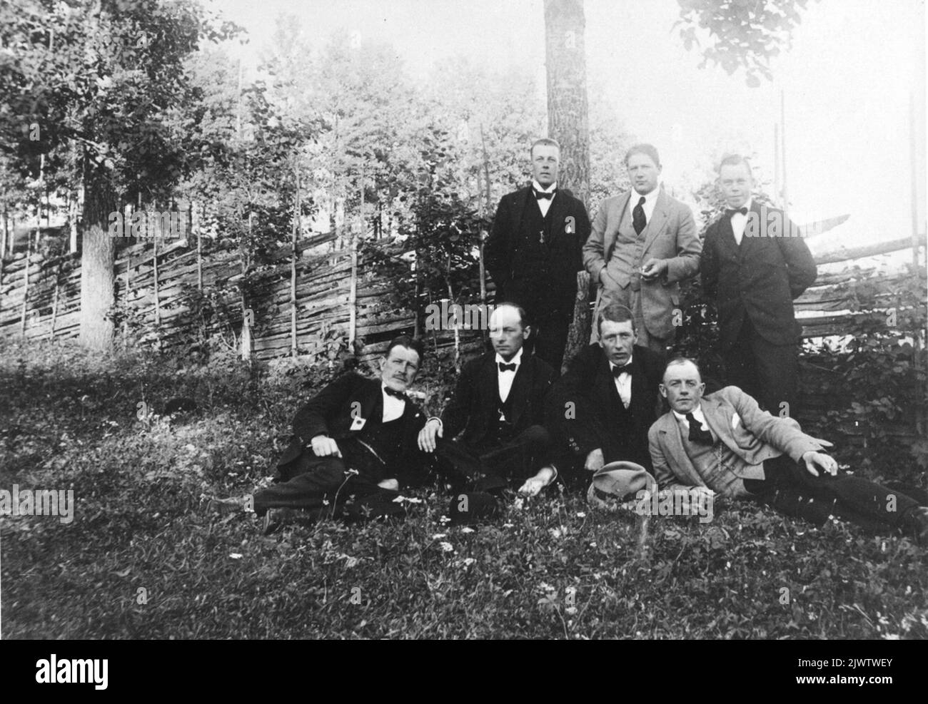 Third man from left Black and White Stock Photos & Images - Alamy