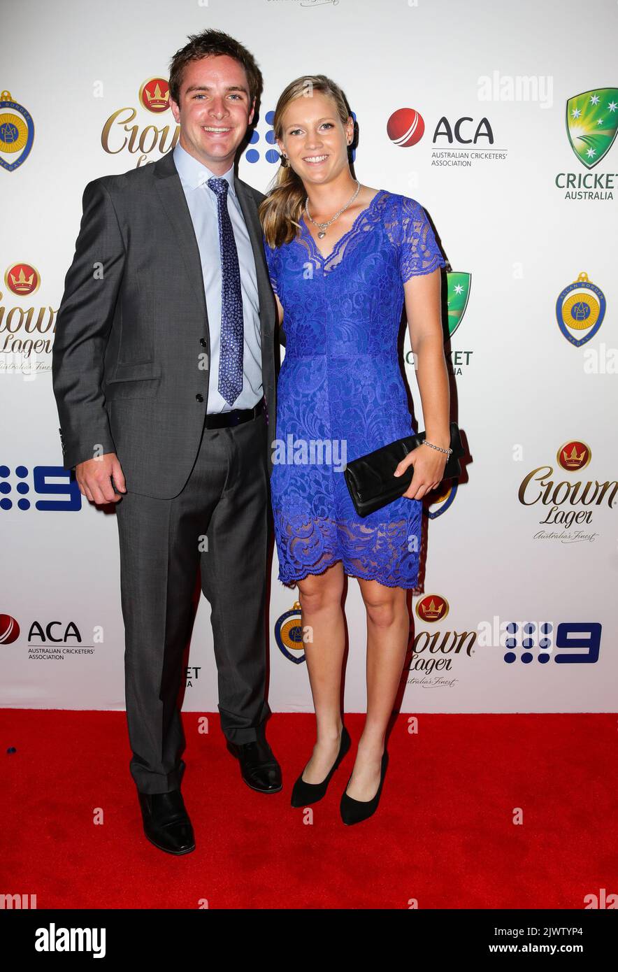 Meg Lanning and James Considine pose on the red carpet at the 2014 ...