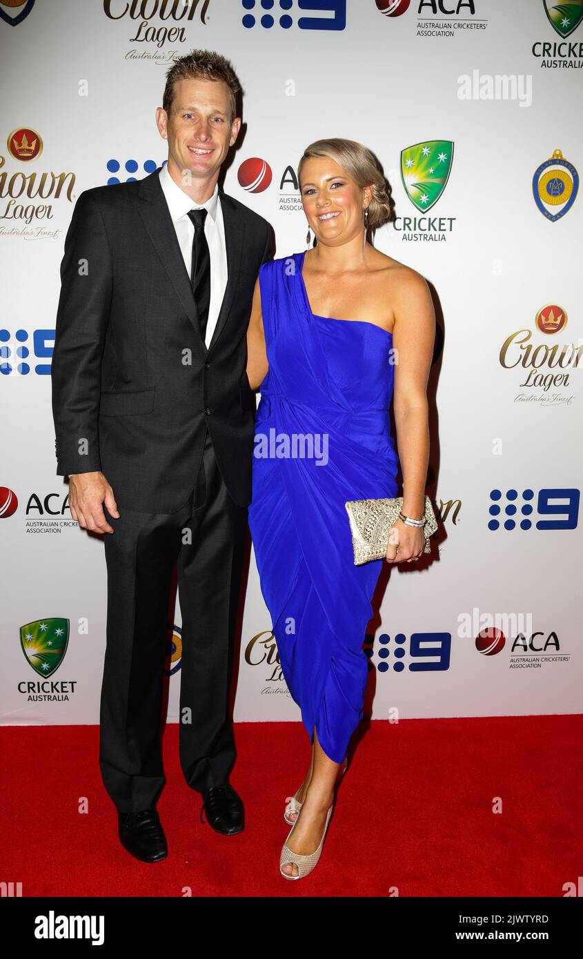 Adam Voges and Kristy Voges pose on the red carpet at the 2014 Allan ...