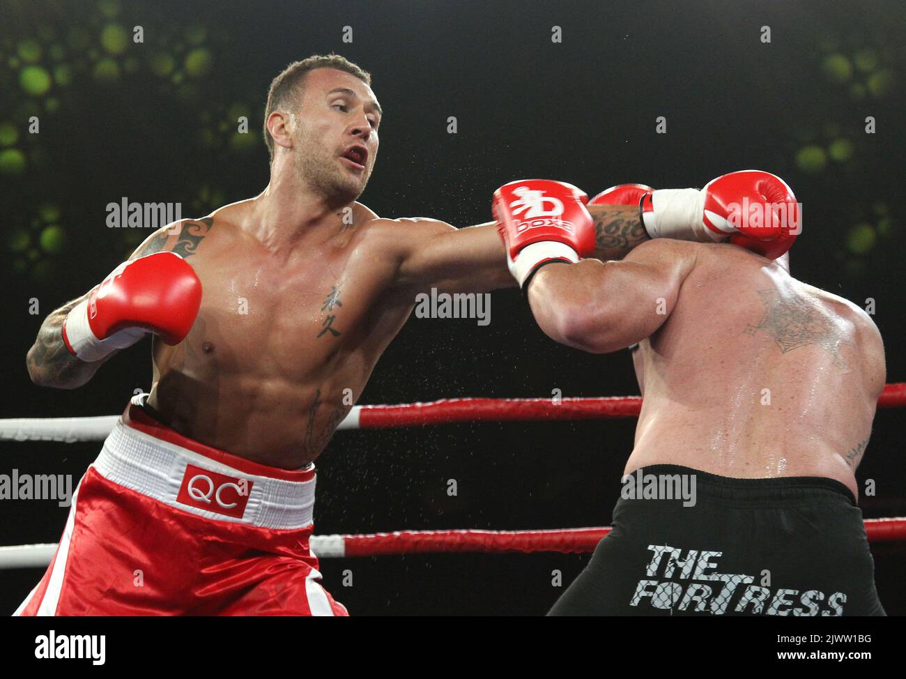 Quade Cooper, L, and Warren Tresidder trade punches during their ...