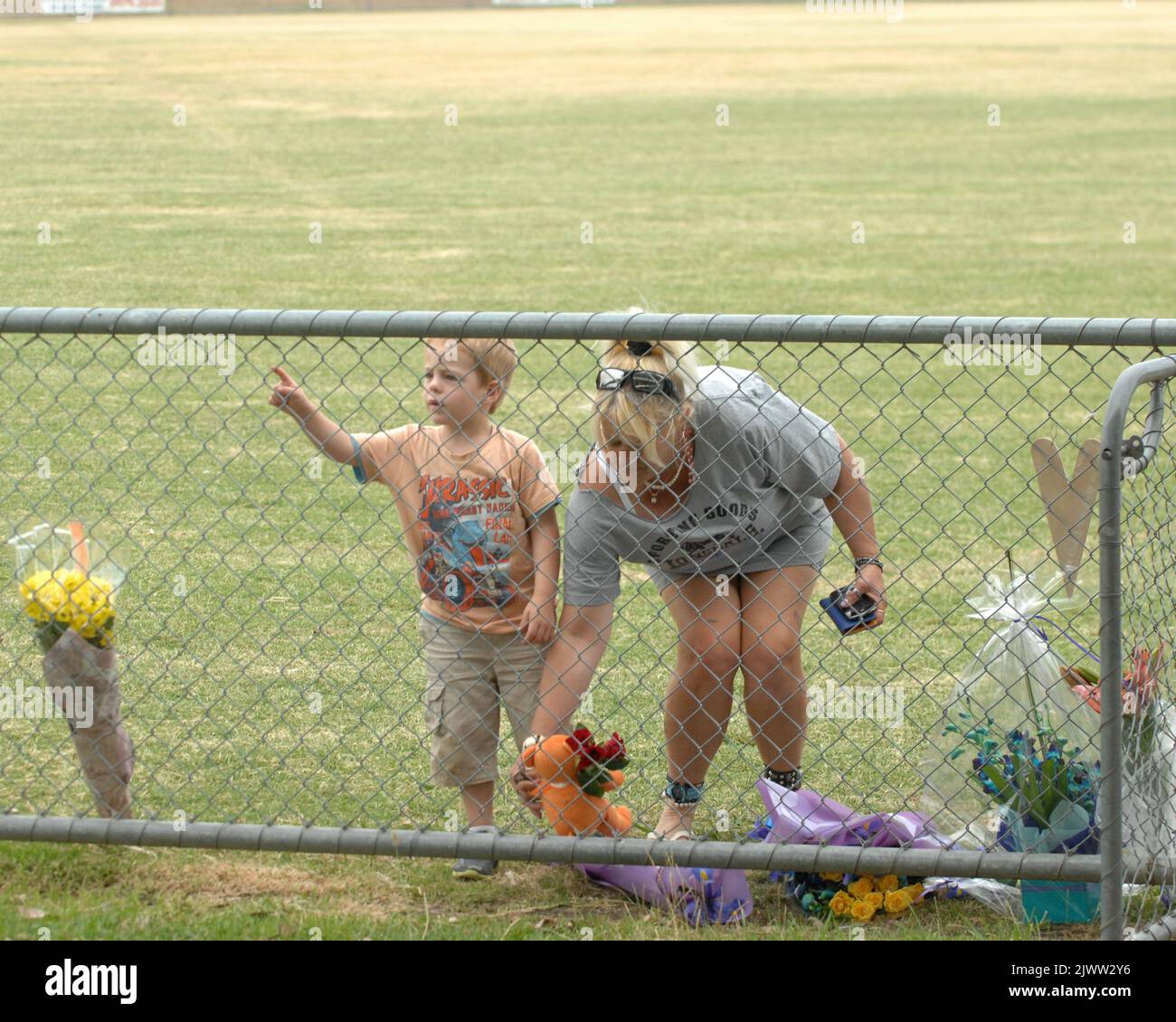 Locals pay tribute at the Tyabb Football & Cricket Club after the death ...
