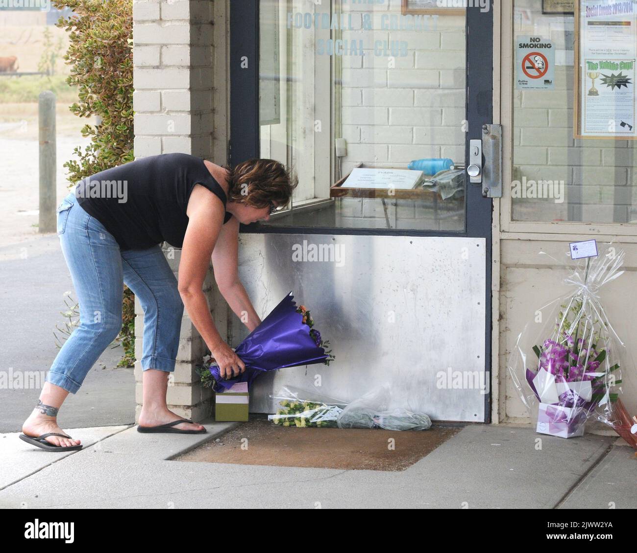 Locals pay tribute at the Tyabb Football & Cricket Club after the death ...