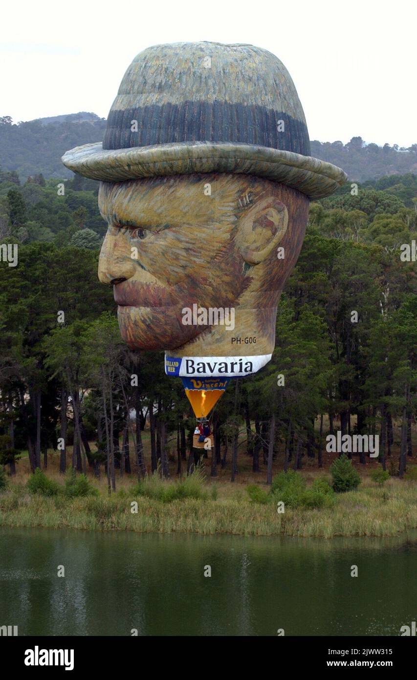 The Vincent van Gogh hot air balloon floats over Lake Burley Griffin at ...