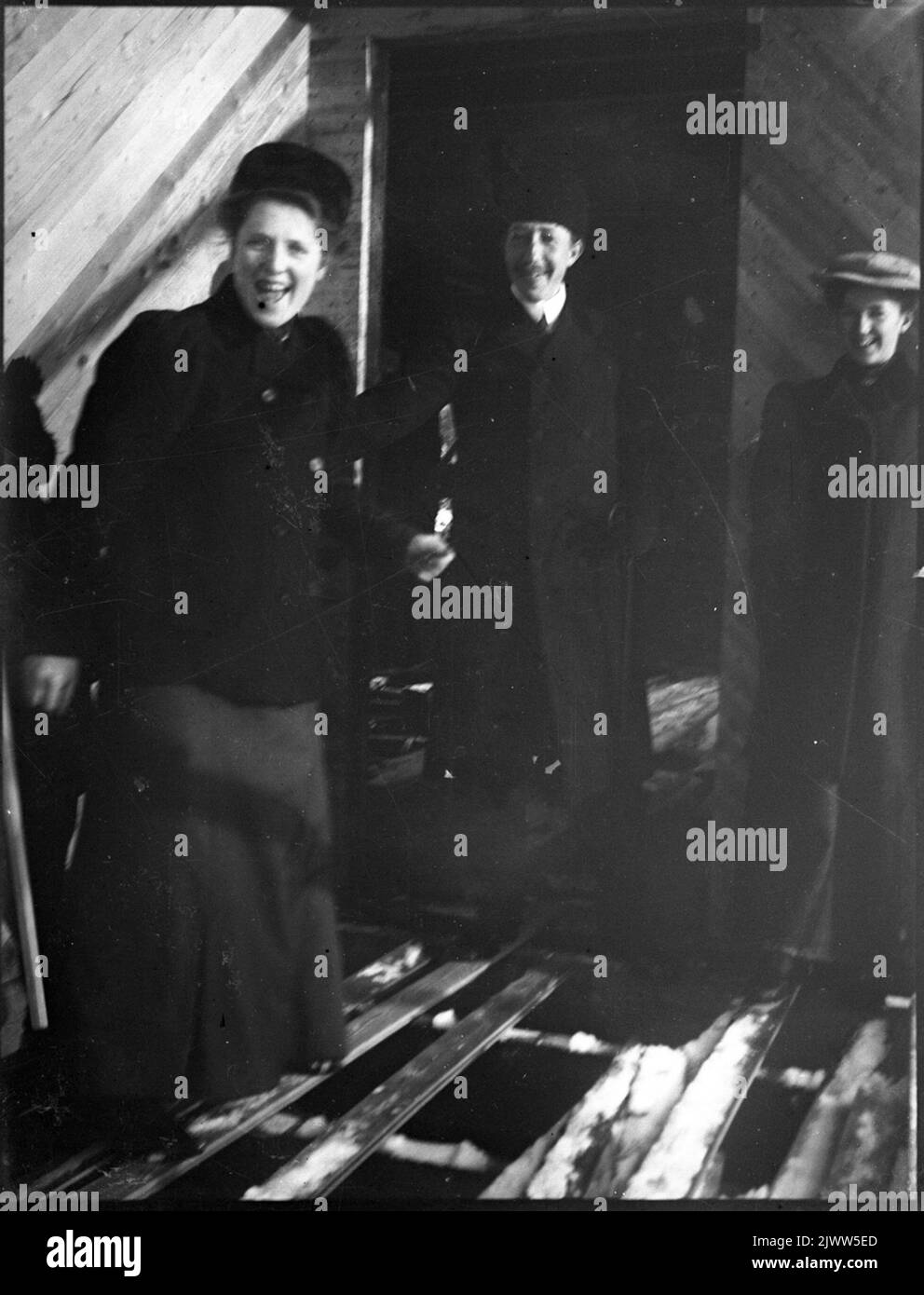 Two women and one man. Två kvinnor och en man Stock Photo - Alamy