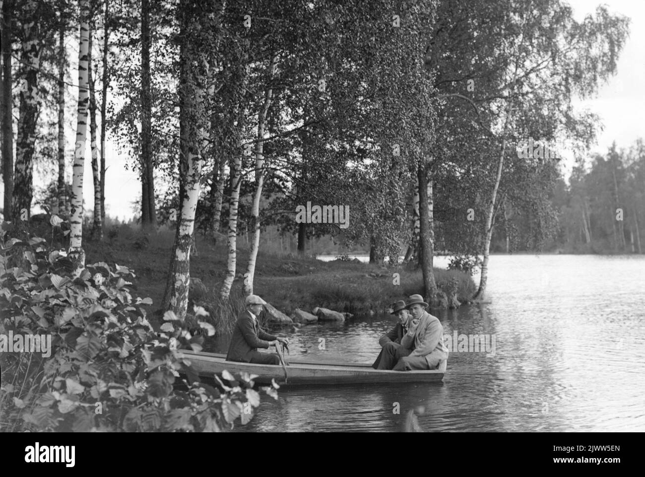 Lower pond in Gammelstilla. At the oars Gustav Englund, Prästhyttan and ...