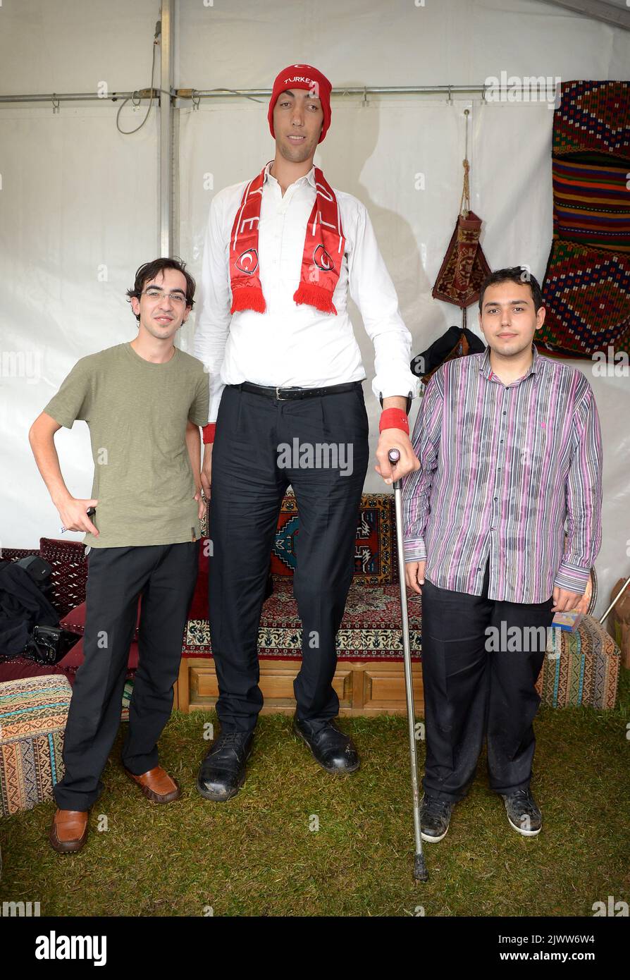The world's tallest person Sultan Kosen, from Turkey, poses for a ...