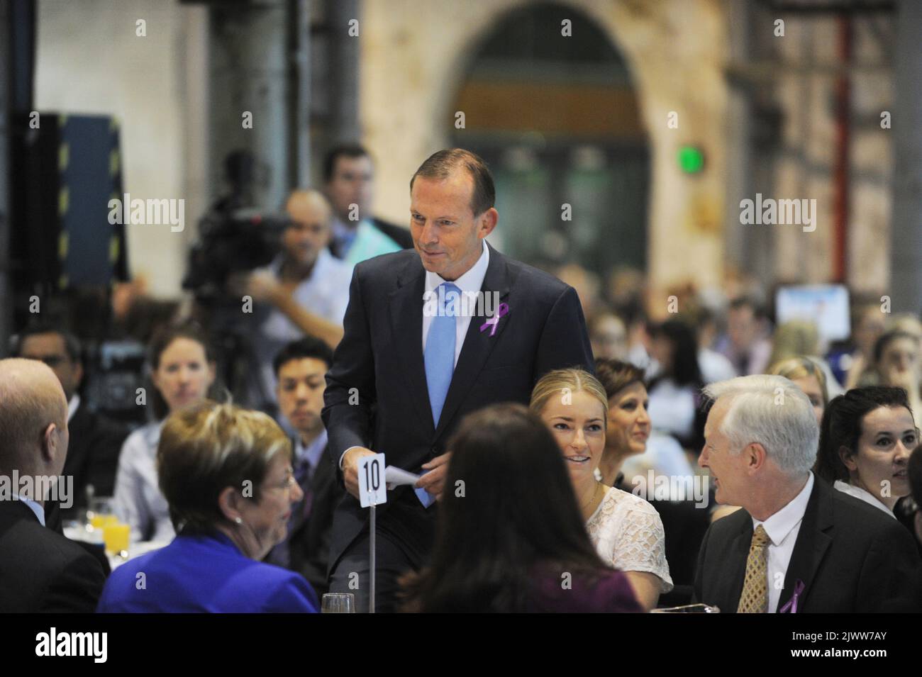 Prime Minister Tony Abbott attends the International Women's Day ...