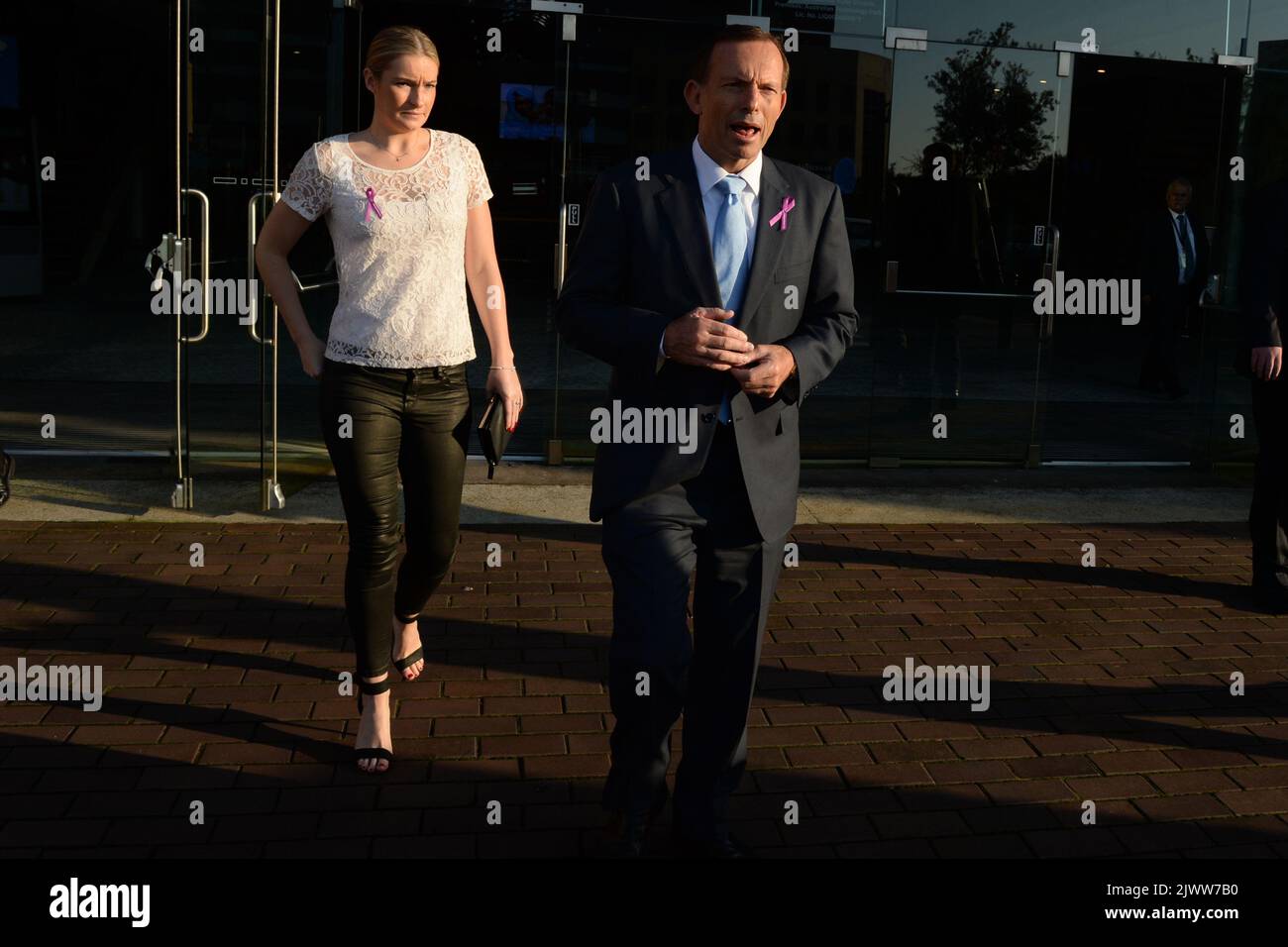 Prime Minister Tony Abbott leaves the International Women's Day ...