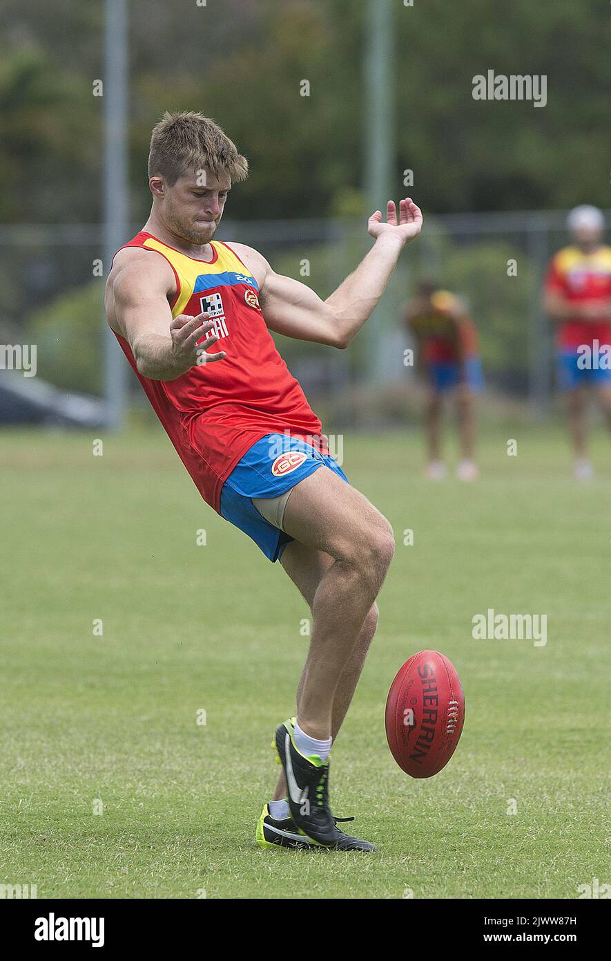 Jackson Allen kicks during the Gold Coast Suns training session on the ...