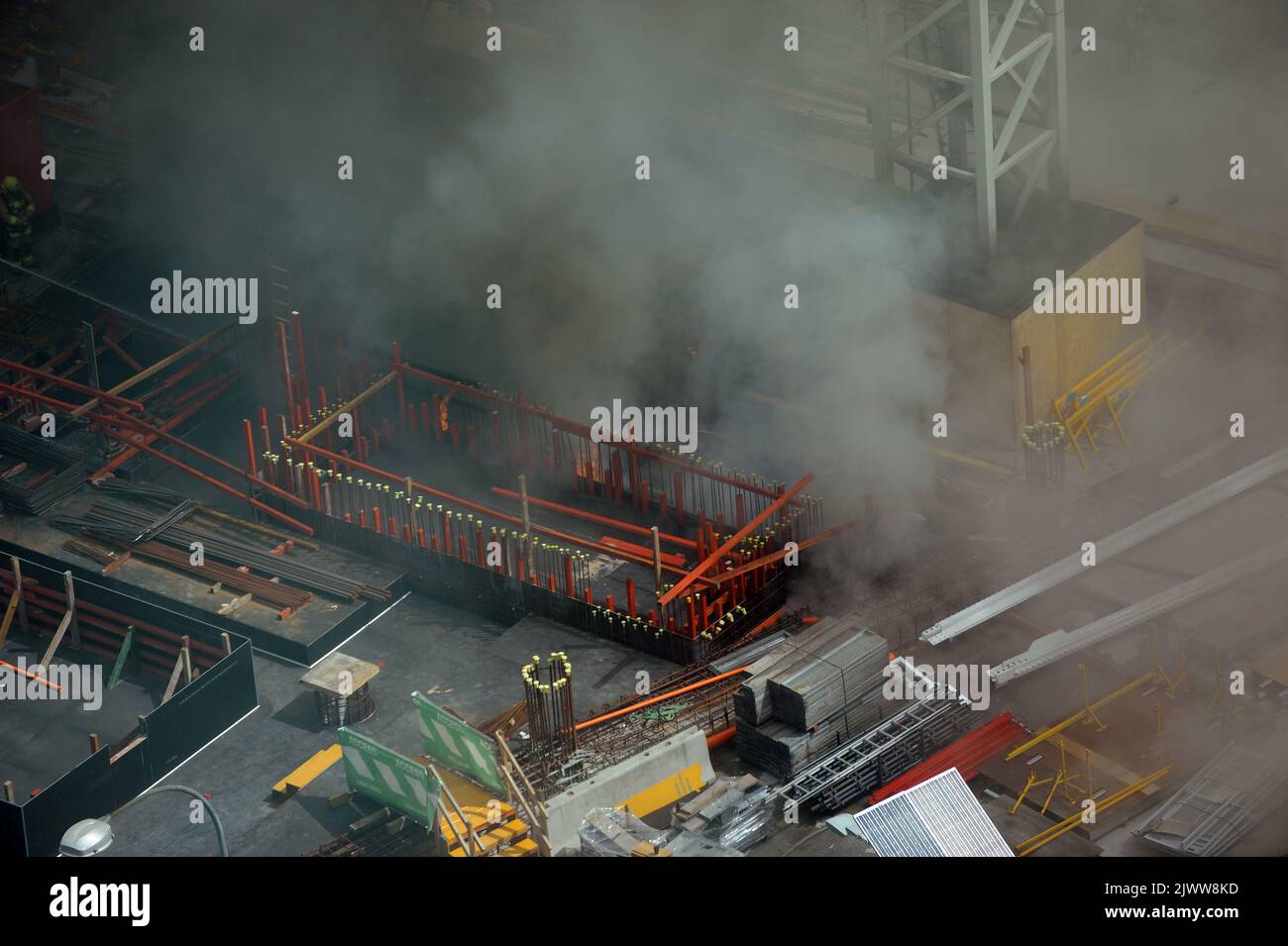 Construction formwork is seen in flames as a fire burns at the ...