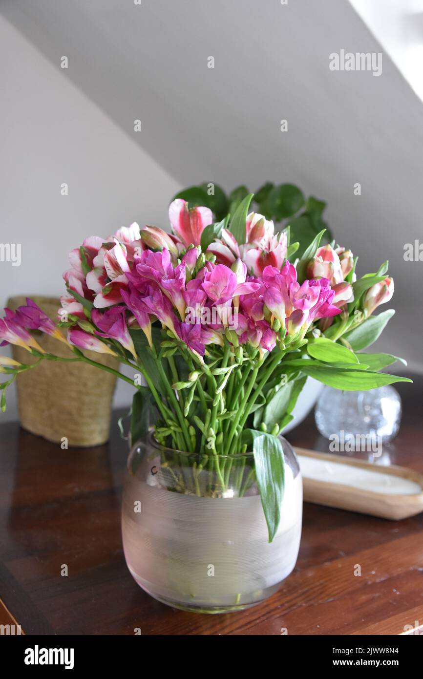 Variety of colorful flowers in a vace Stock Photo - Alamy