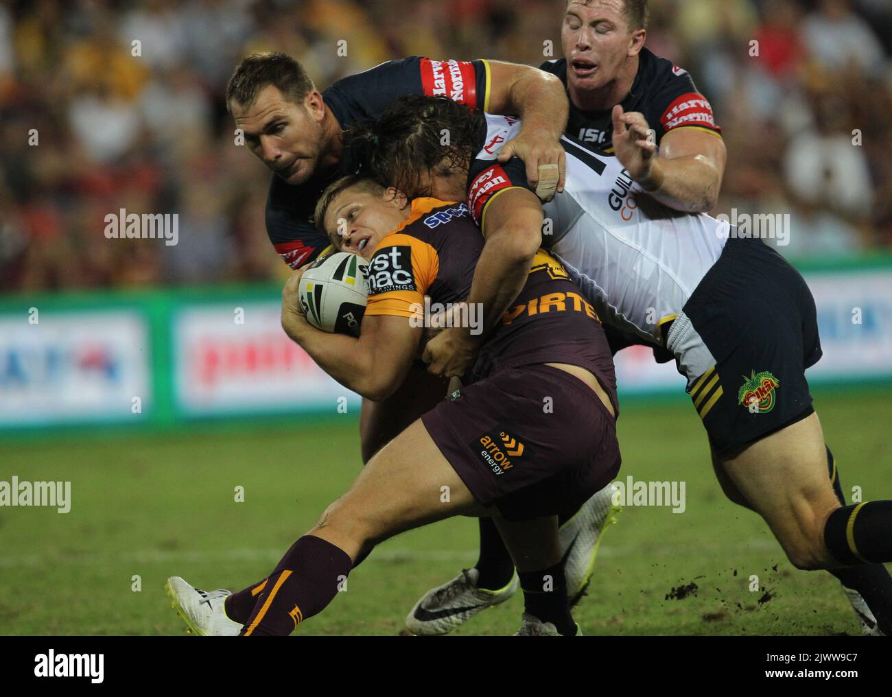 Dale Copley buried by Bolton Ashton Sims and Glenn Hall during Round 2 ...