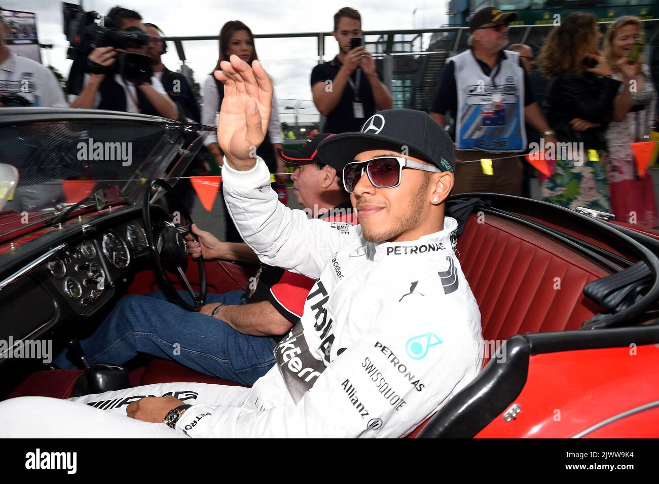 British Formula 1 driver Lewis Hamilton waves to fans during the ...