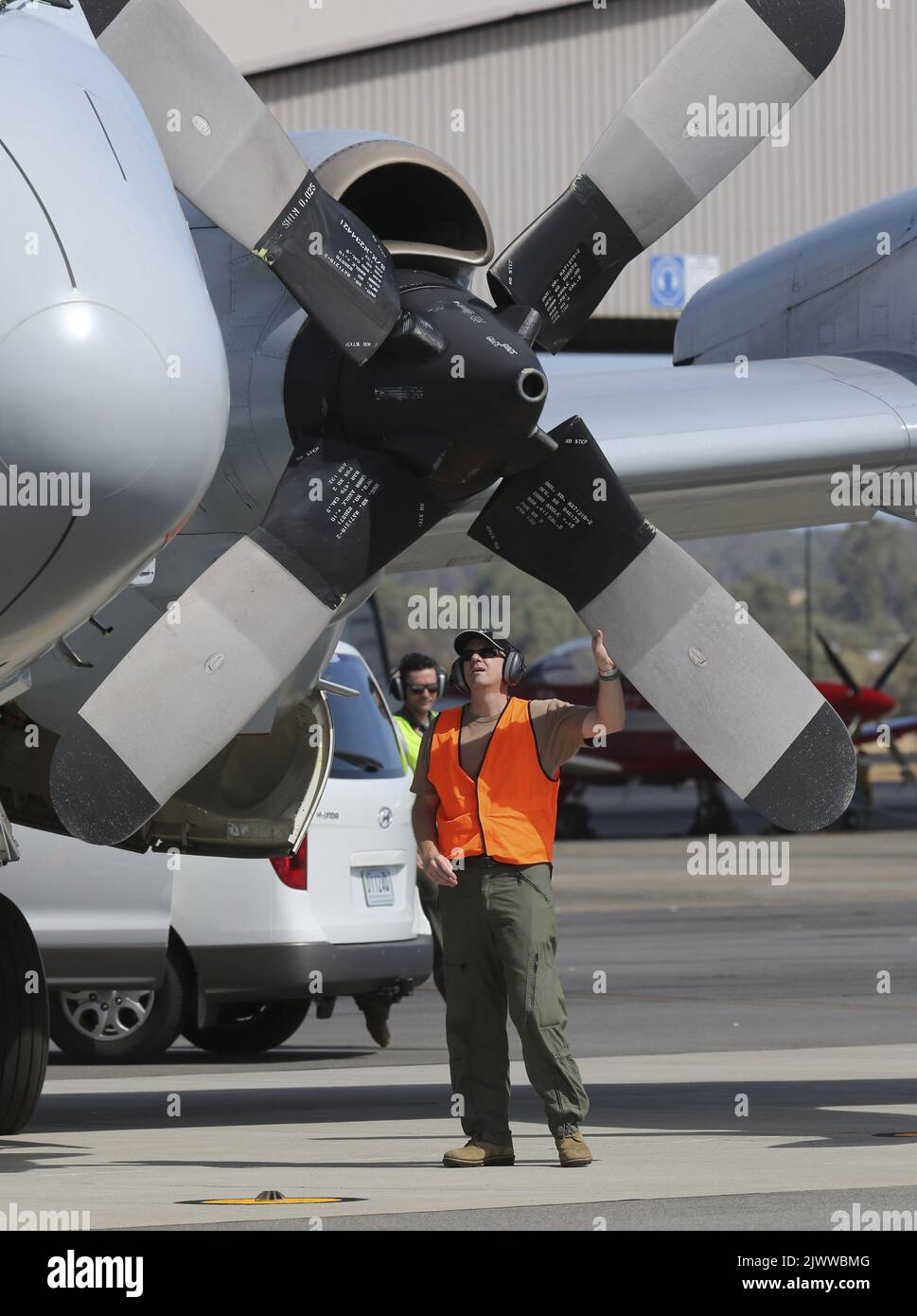 A ground crewman carries out pre flight check on a Royal Australian Air ...