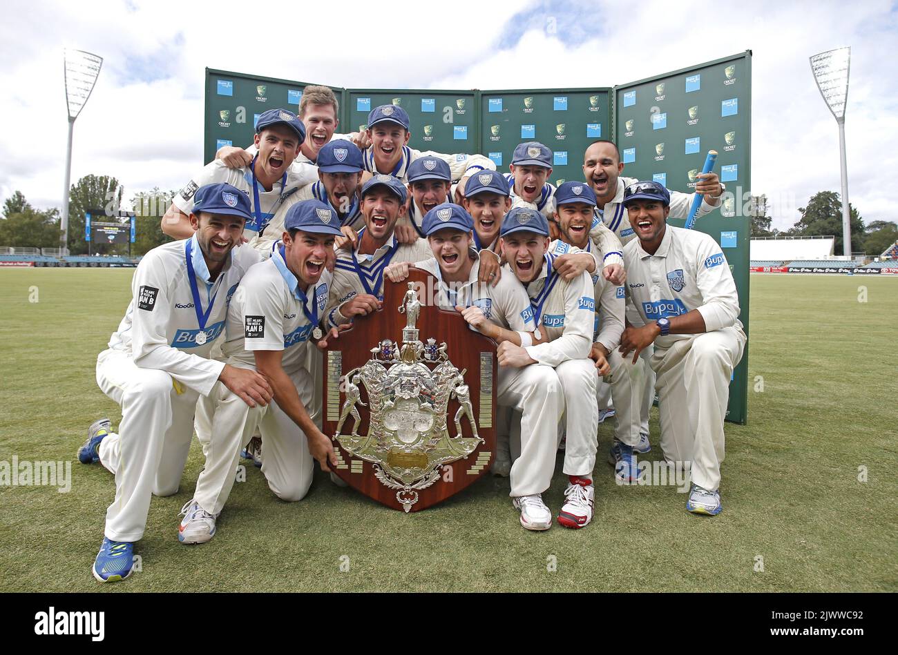 Blues players pose with the Sheffield Shield after a draw in the final ...