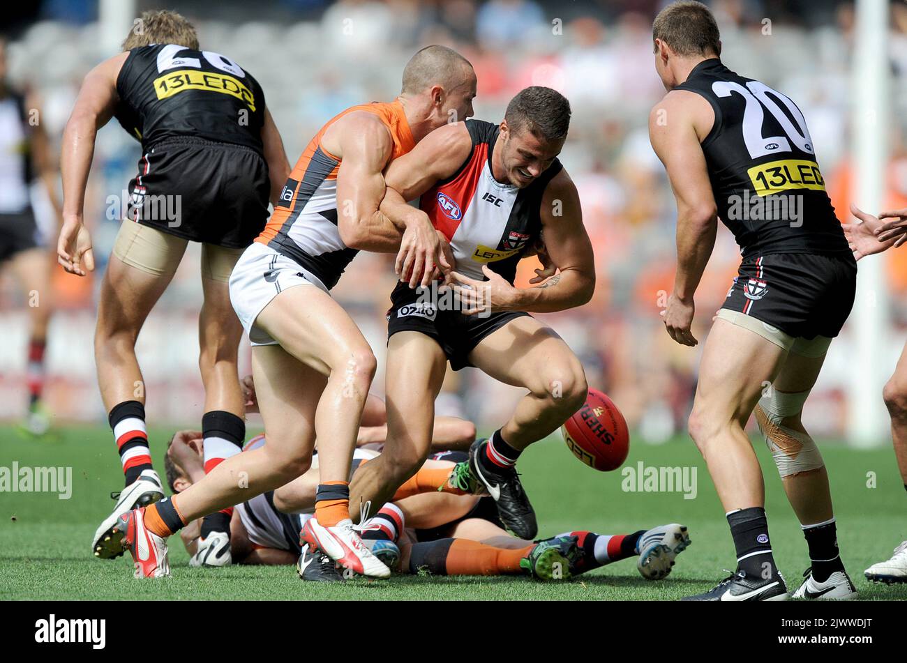 Callan Ward of GWS tackles Nathan Wright of St Kilda during the Round 2 ...