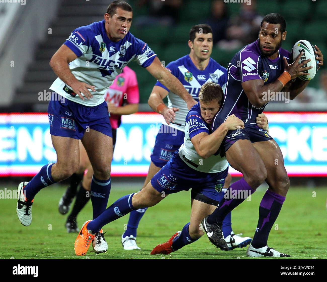 Sisa Waqa looks for support as he is grabbed by Trent Hodkingson during ...