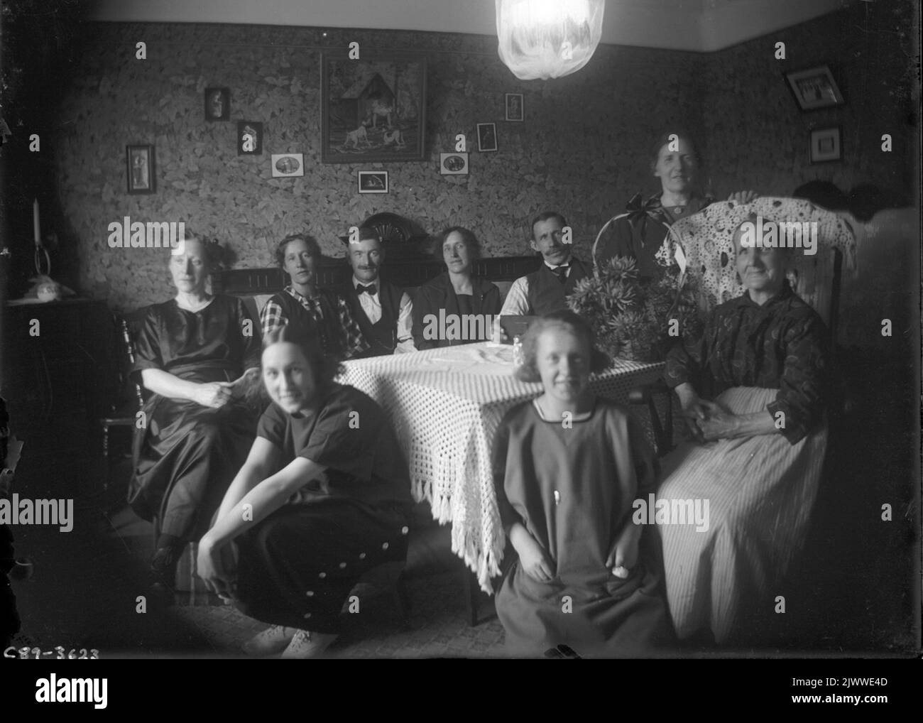 Group picture, nine people gathered in a finery. Gruppbild, nio ...