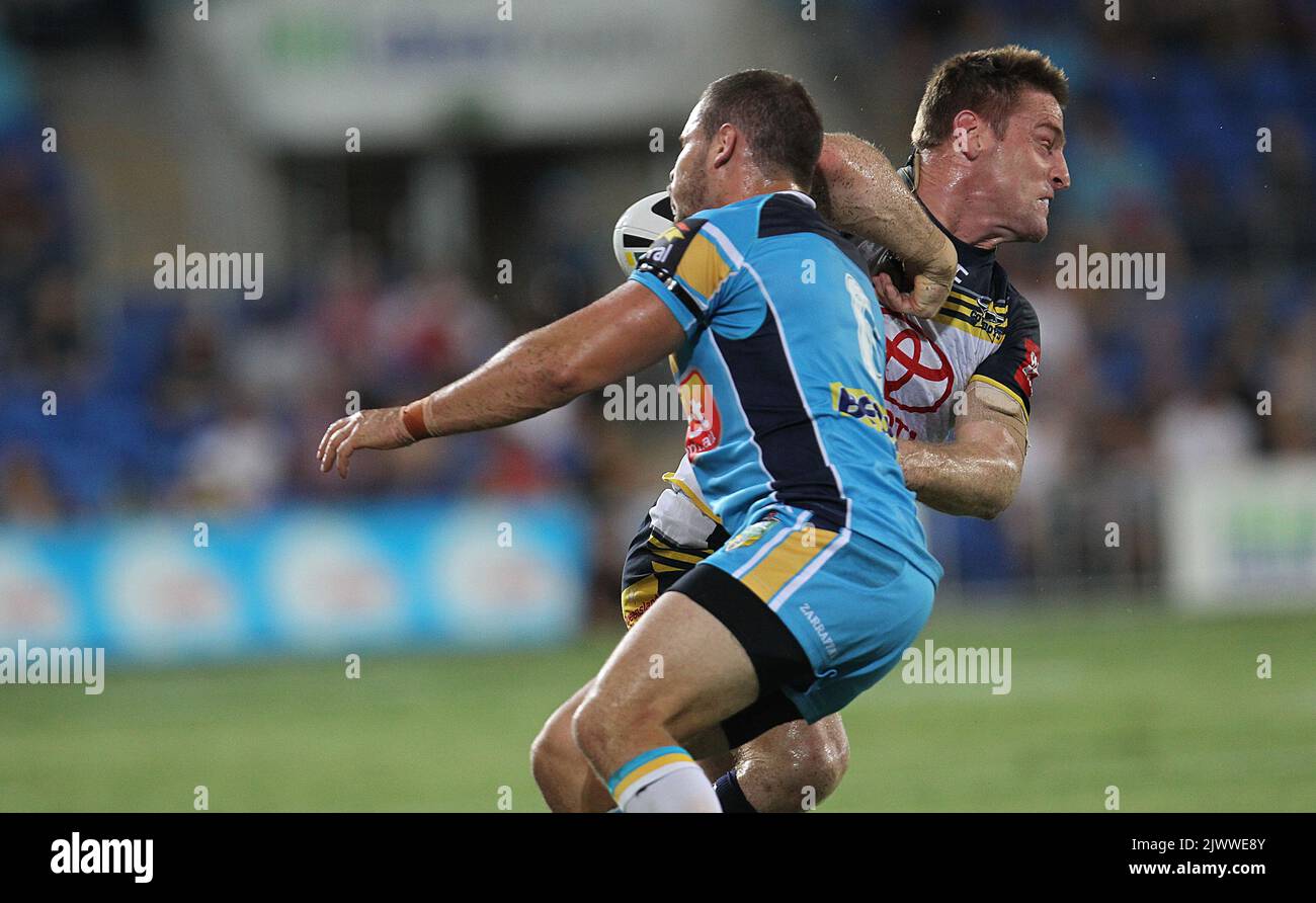 Brent Tate loses the ball as he is hit by Aidan Sezer during the NRL ...