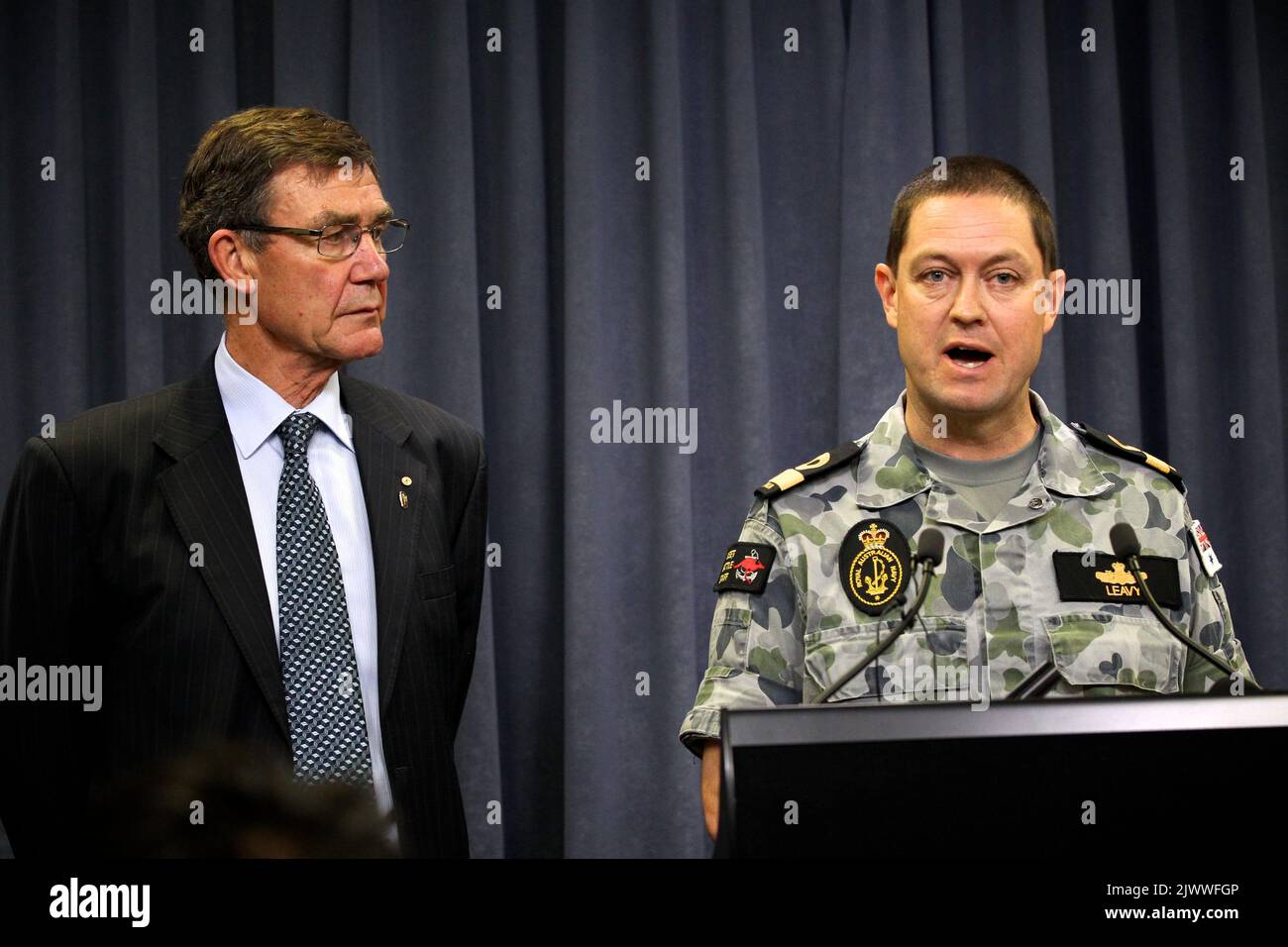 Commodore Peter Leavy from the Australian Navy talking at a press ...