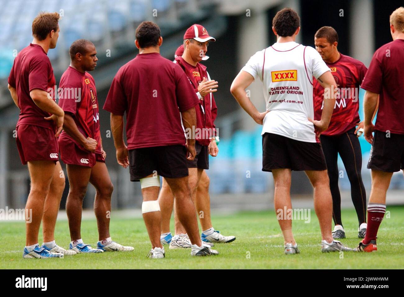 Coach Michael Hagan briefs his charges as the Queensland State of Origin team trained at Telstra ...