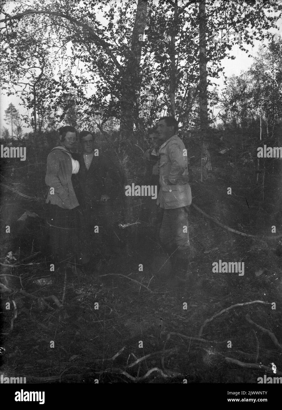 Four people outdoors. Fyra personer utomhus Stock Photo - Alamy