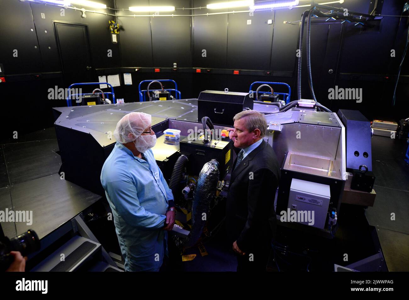 Industry minister Ian Macfarlane listens to electrical engineer Robert Brookfield at the HERMES ...