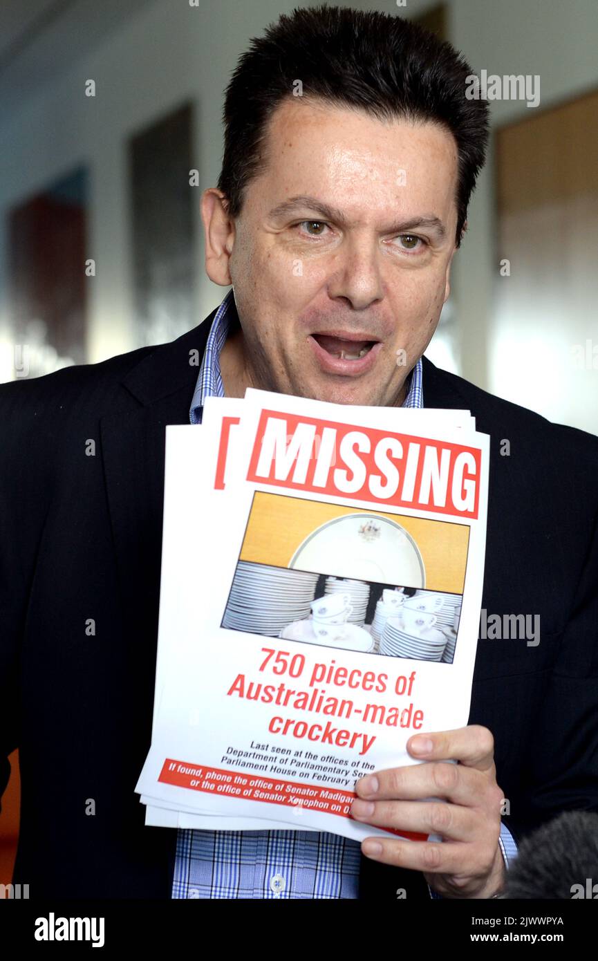 Senator Nick Xenophon displays a poster as he prepares to hunt n the ...