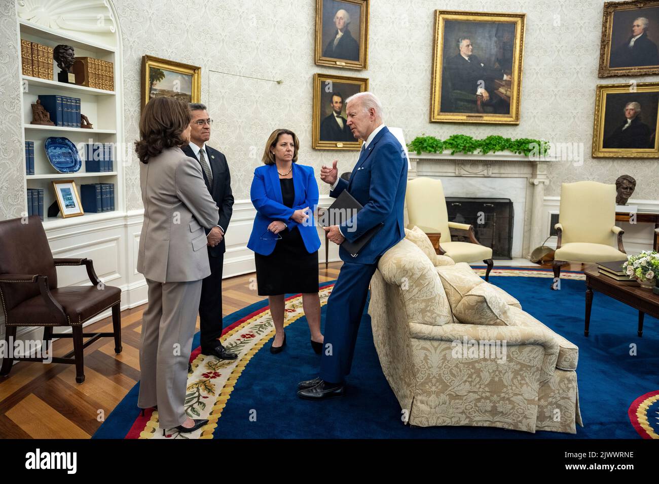 President Joe Biden and Vice President Kamala Harris talks with ...