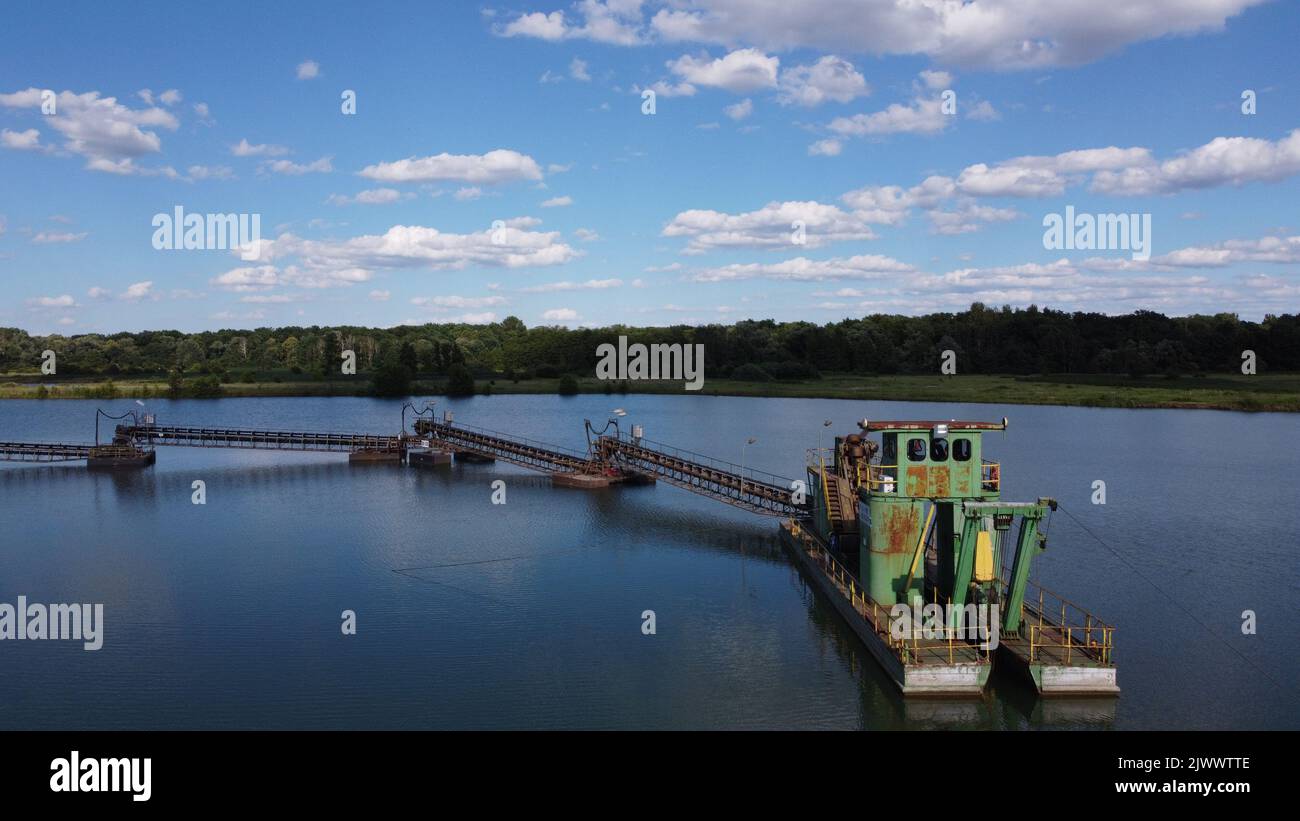 floating bucket excavator in quarry for sand Czech republic Podebrady ...