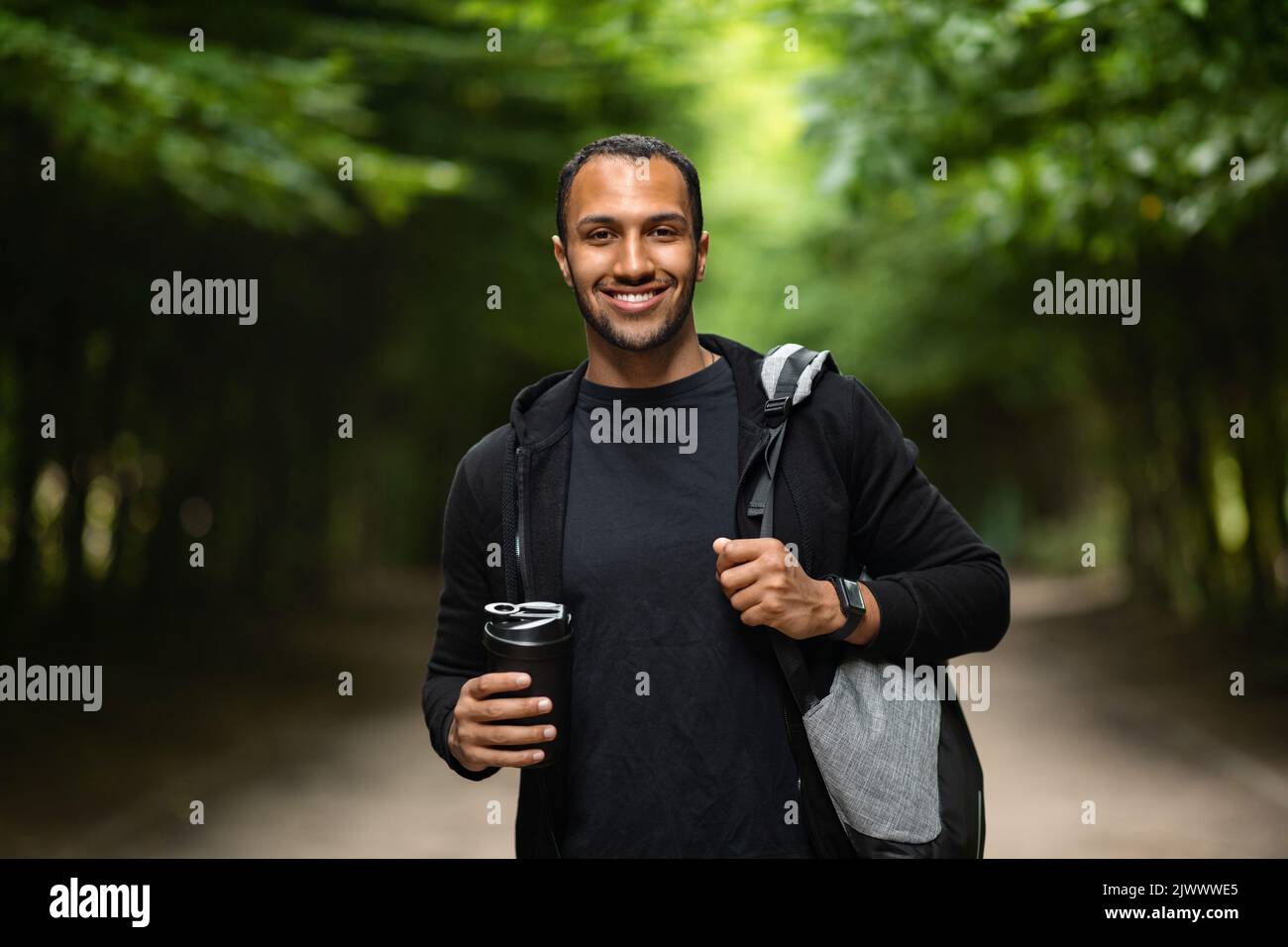 positive black sportsman going back home after outdoor workout Stock ...