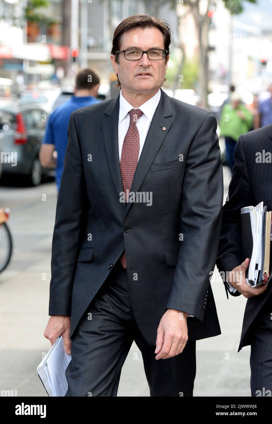 Former Climate Change minister Greg Combet leaves the Magistrates Court ...
