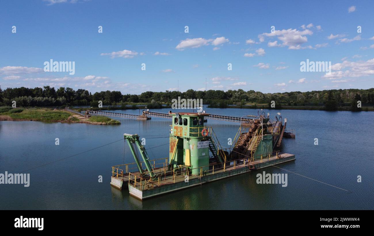 floating bucket excavator in quarry for sand Czech republic Podebrady ...