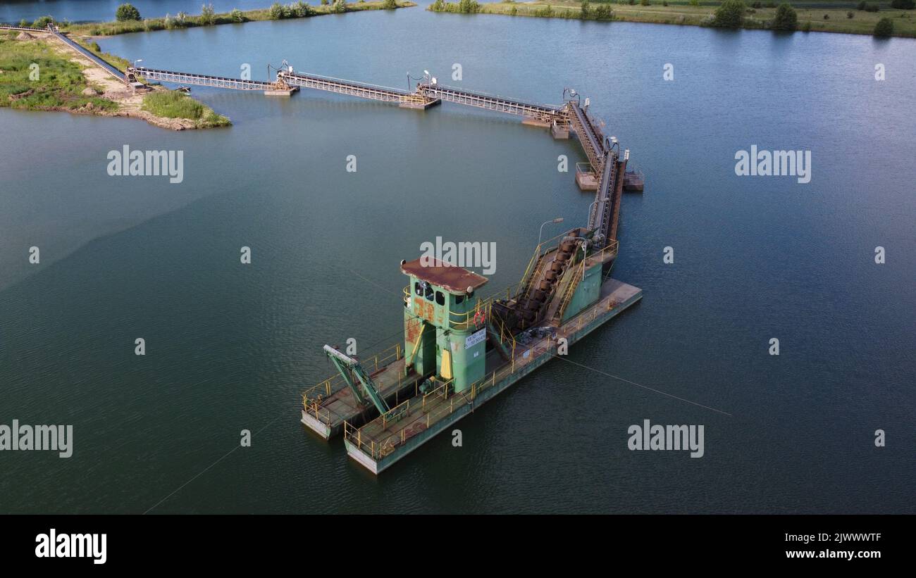 floating bucket excavator in quarry for sand Czech republic Podebrady ...