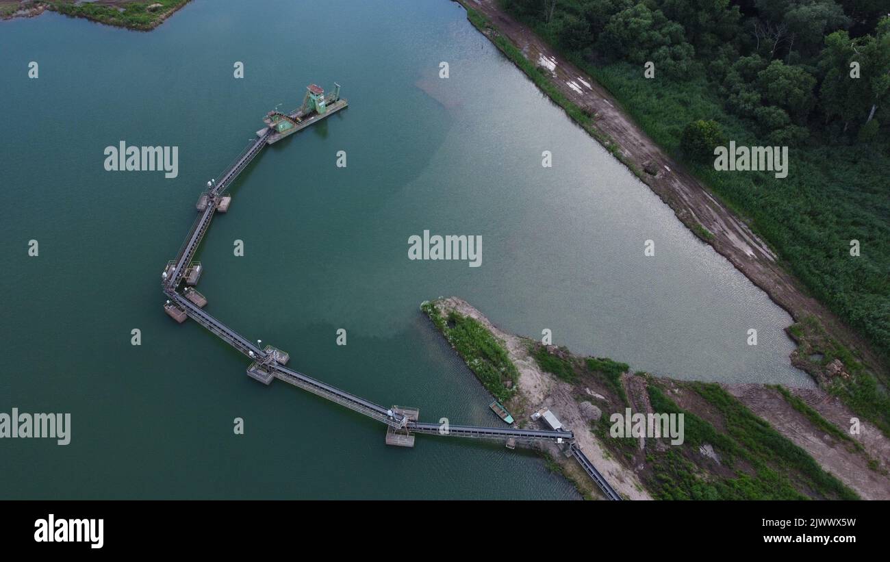 floating bucket excavator in quarry for sand Czech republic Podebrady ...