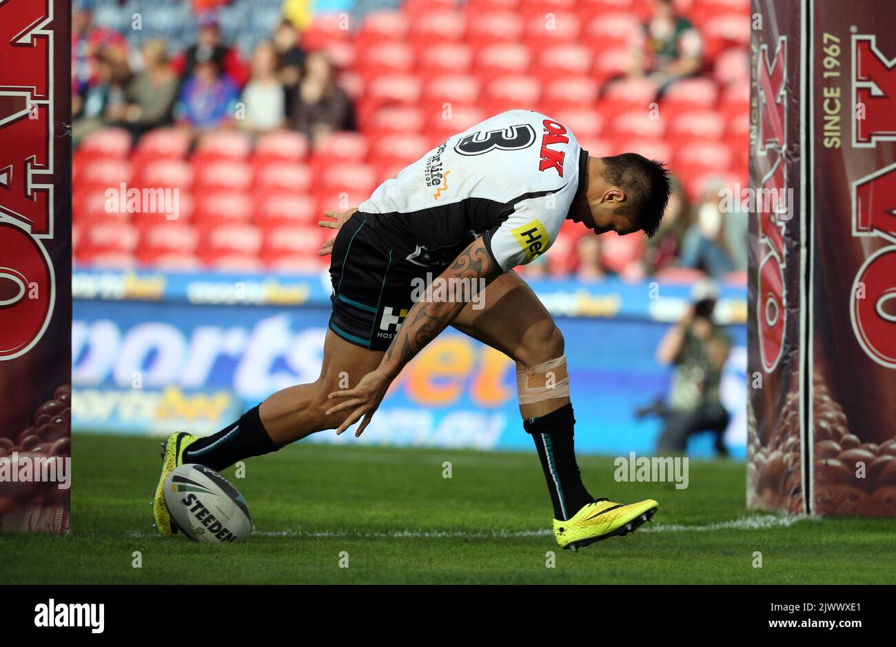 Dean Whare scores during the NRL Rugby League Round 9 match between ...
