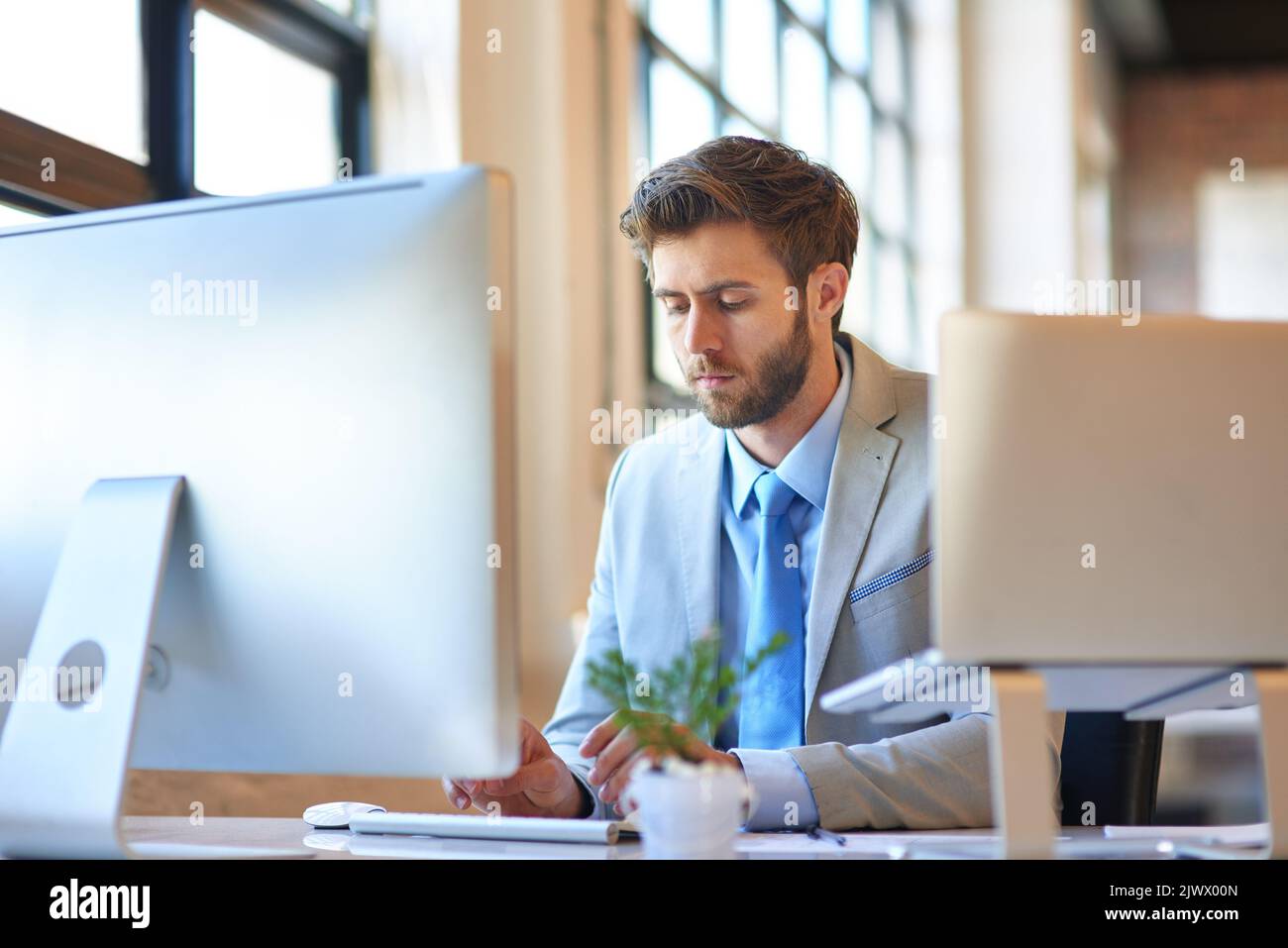Working toward career goals. businesspeople in the office Stock Photo ...