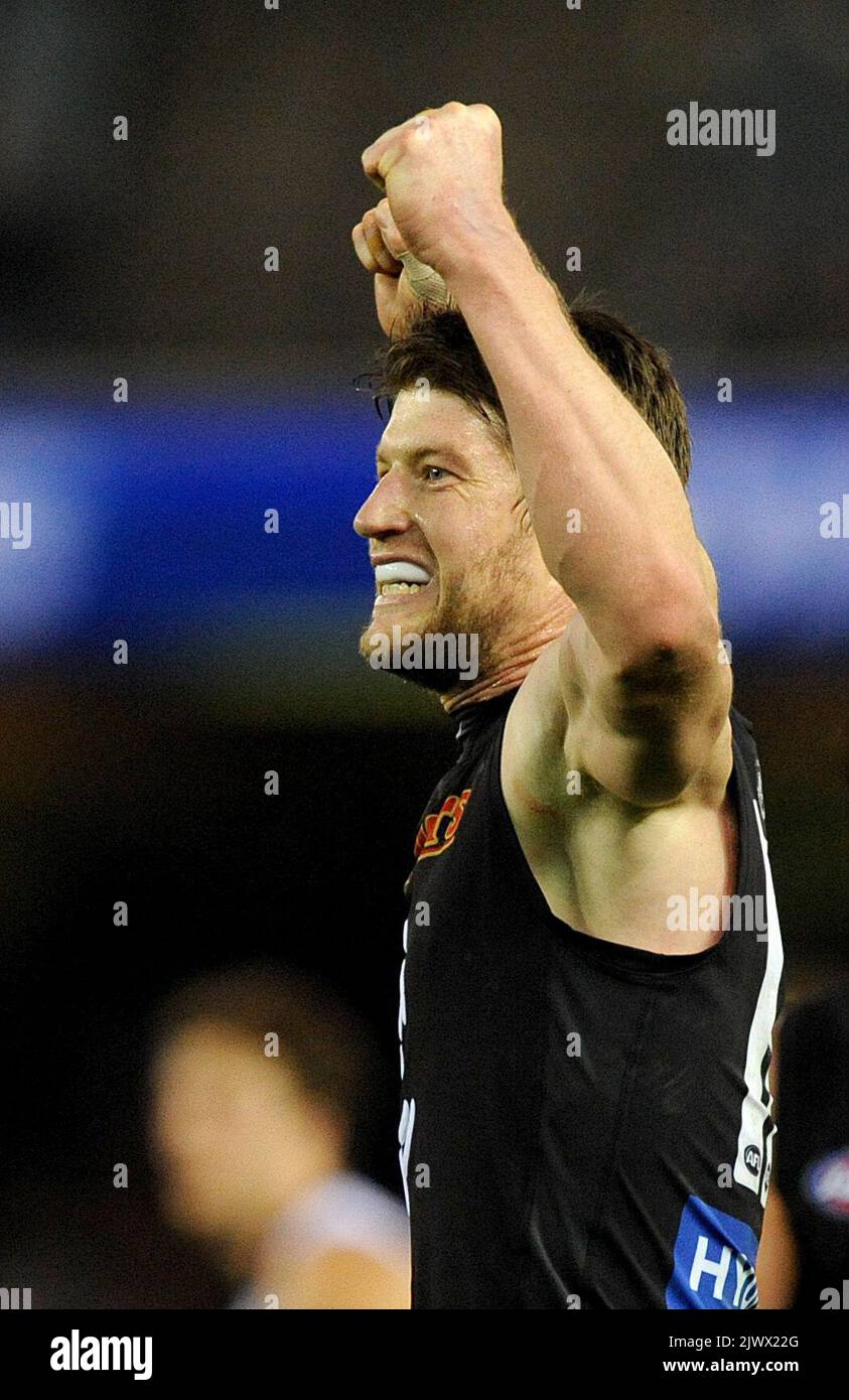 Sam Rowe of Carlton celebrates after kicking a goal and putting the ...