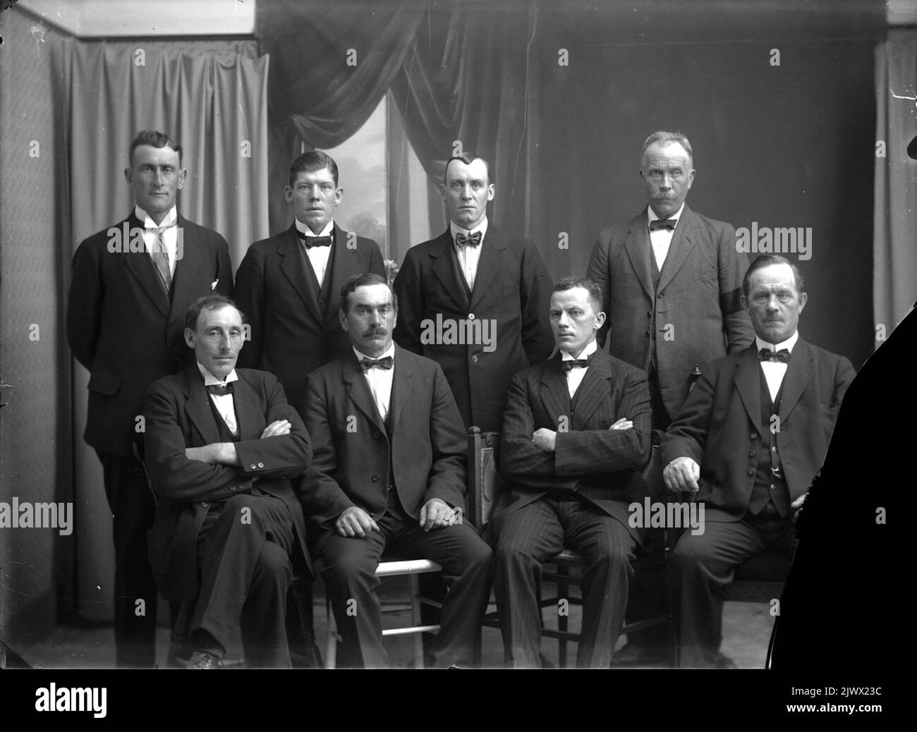 Eight men hi-res stock photography and images - Alamy