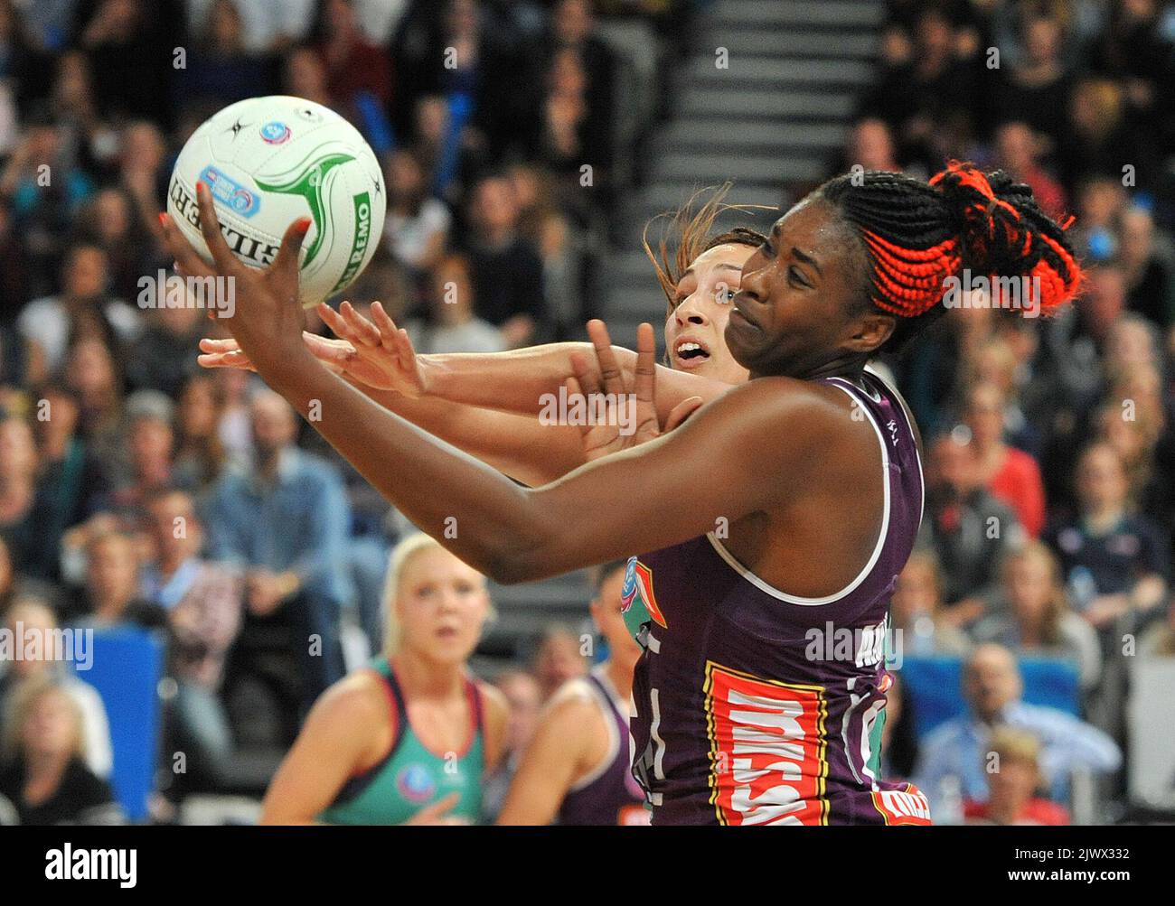 Queensland Firebirds' Romelda Aiken (R) and Melbourne Vixens' Geva ...