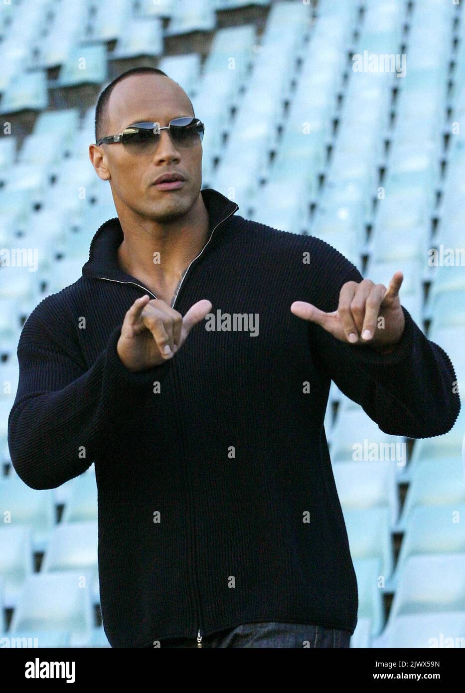 Professional wrestler Dwayne Johnson aka 'The Rock' greets ...