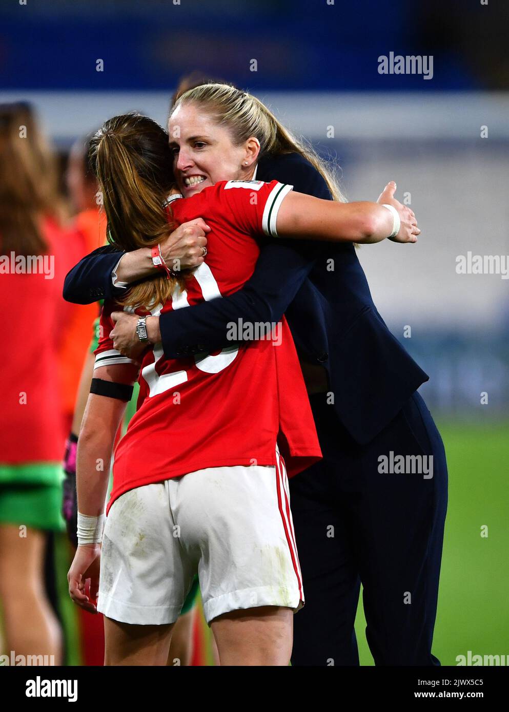 Wales head coach Gemma Grainger greets Carrie Jones following the 2023 ...